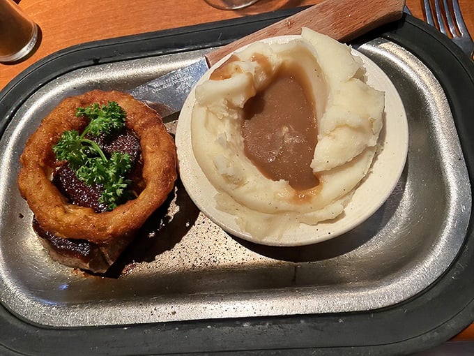 Steak and potatoes elevated to art form &ndash; this filet with its velvety center and the mashed potatoes drowning happily in gravy represents comfort food perfection.