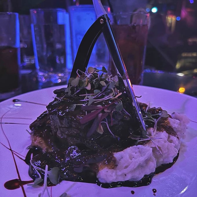 This filet mignon presentation turns dinner into performance art with its dramatic plating style. 