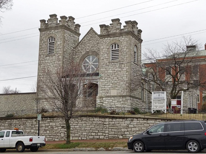 First Unitarian Church stands like a limestone sentinel, offering spiritual sanctuary and architectural wonder without the big-city admission price.