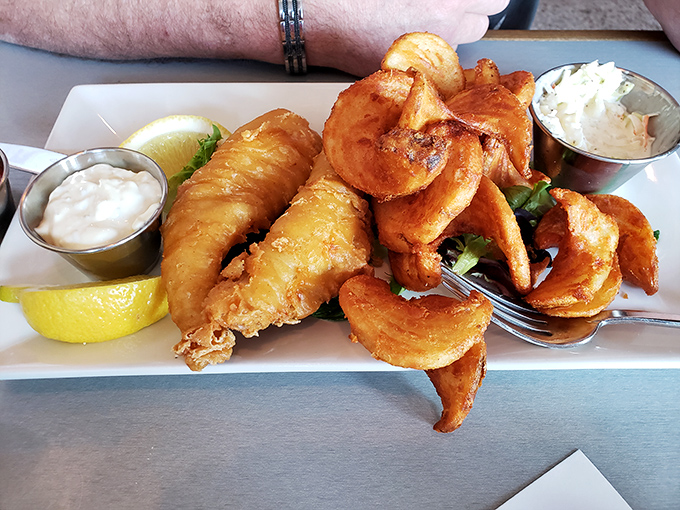 The golden standard that brings pilgrims from Detroit to Grand Rapids seeking crispy, flaky perfection.