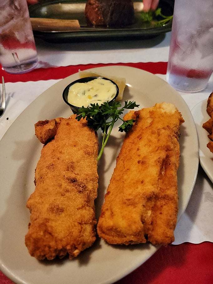 The fish fry that launched a thousand Friday pilgrimages&mdash;golden perfection that shatters with each bite, revealing flaky white fish beneath.