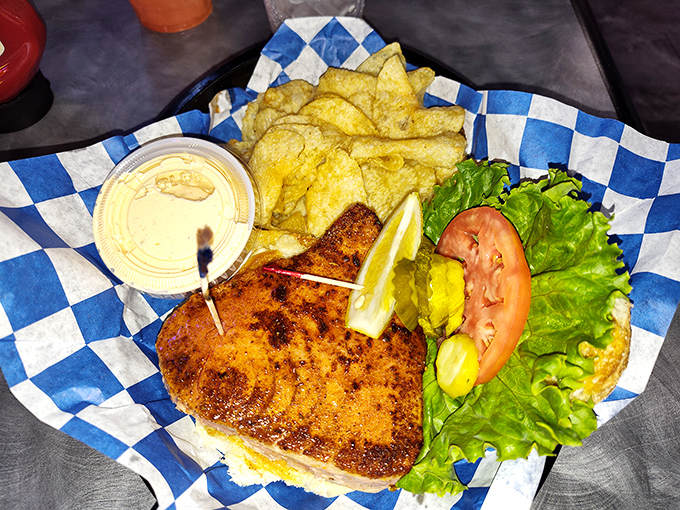 The fish sandwich that launched a thousand lake trips &ndash; perfectly seasoned, expertly fried, and nestled on a bun that knows its supporting role in this aquatic masterpiece.