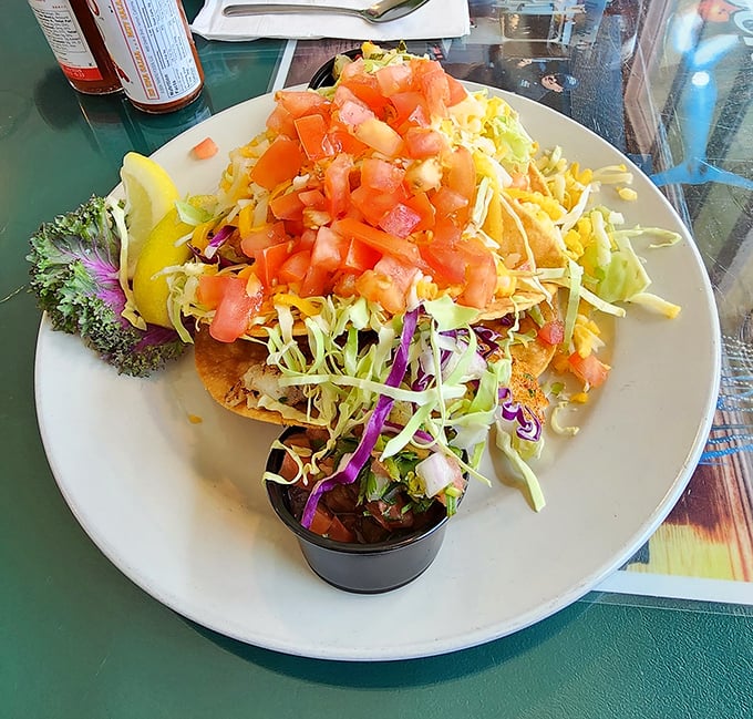 This isn't just a fish taco &ndash; it's a colorful celebration that requires both hands and several napkins. Worth every delicious mess.