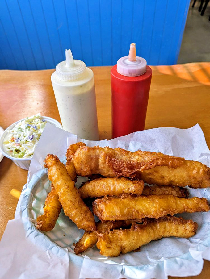 When you can't decide between fish and calamari, West Coast says "why choose?" The condiment squeeze bottles stand ready for your personal flavor journey.