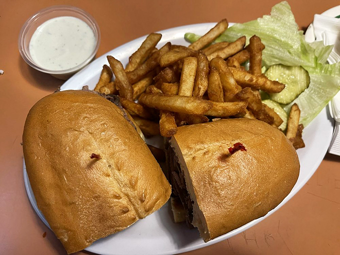 Comfort food elevated: country gravy alongside a cheese-topped masterpiece with those famous hash browns standing guard. A plate of pure satisfaction.