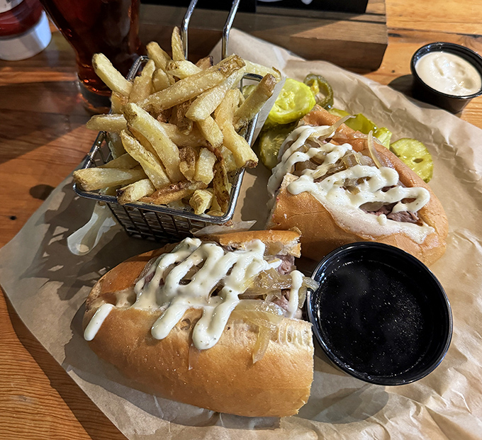 The French Dip sandwich&mdash;where thinly sliced beef meets its soulmate in au jus. Those fries aren't just a side; they're co-stars.