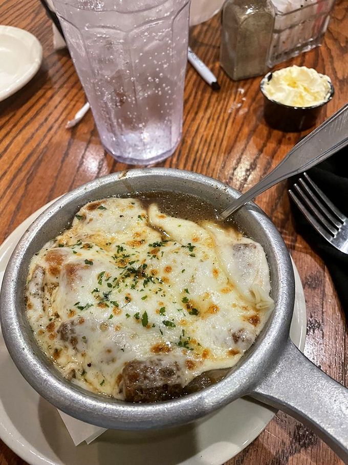 French onion soup that's more cheese than soup – exactly as it should be. The ultimate comfort food wearing a gooey, golden crown.