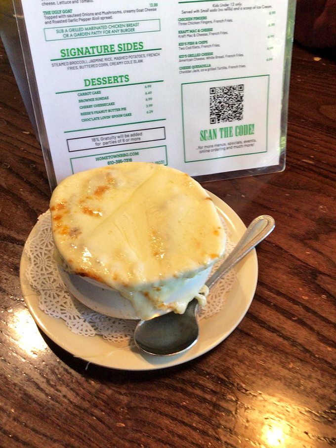French onion soup crowned with melted cheese so magnificent, it could make a grown person consider relocating to Pennsylvania.