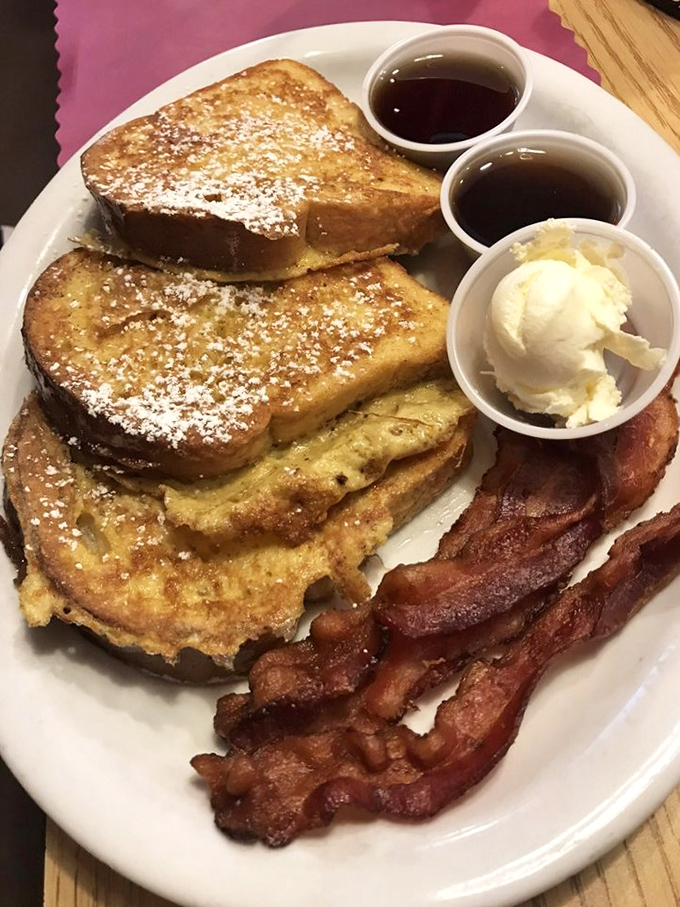 French toast that's dressed for success. Thick-cut, golden-brown, and accompanied by bacon that's achieved that perfect crispy-but-not-too-crispy state of nirvana.