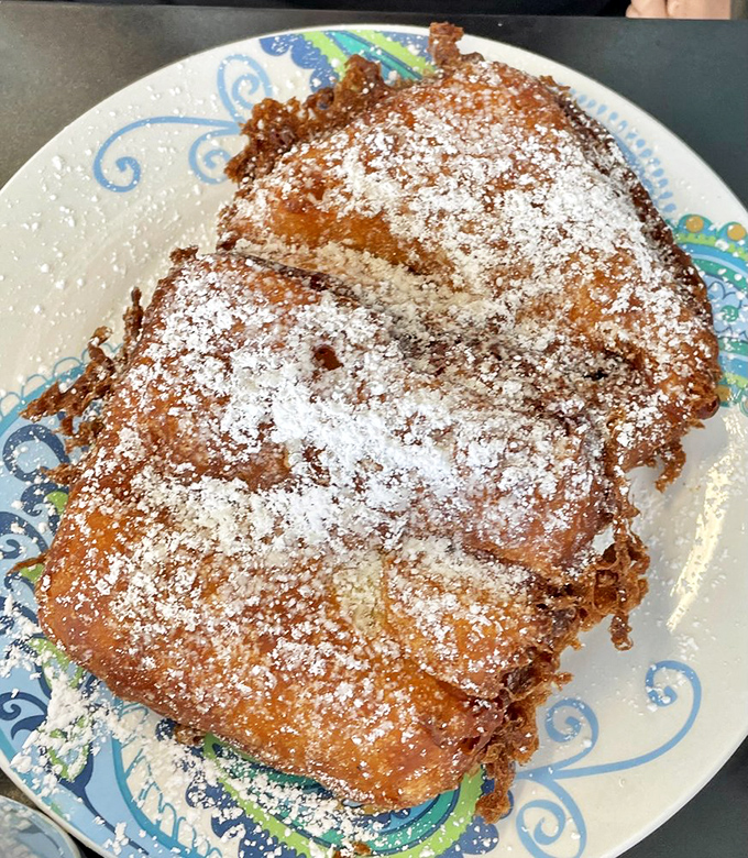 French toast that crosses into dessert territory&mdash;golden, crispy edges giving way to a custardy center. Morning indulgence at its finest.