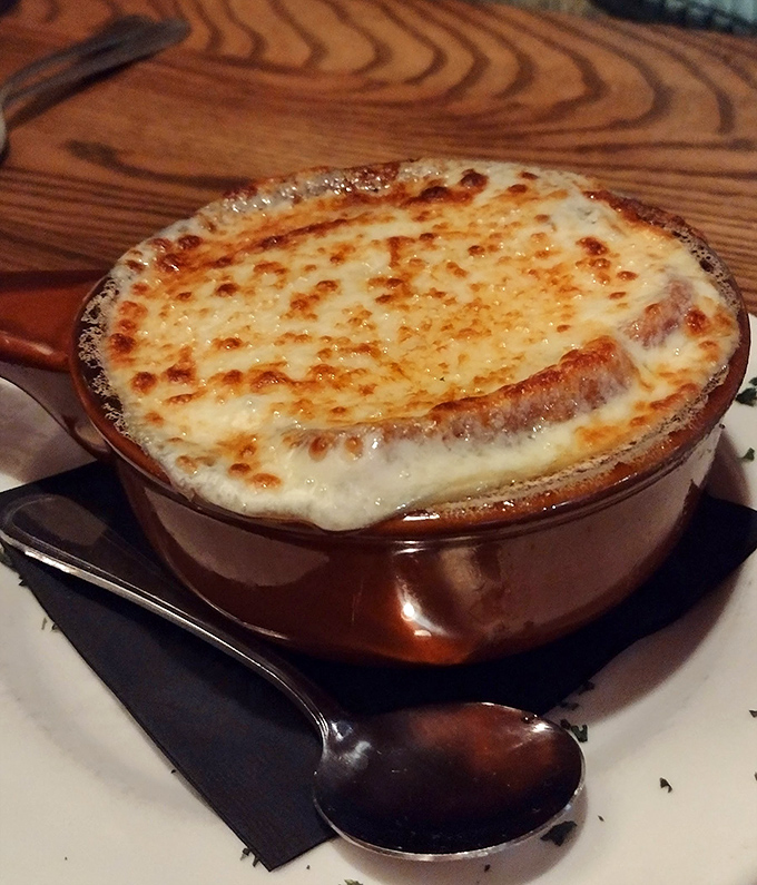 French onion soup with a golden crown of bubbling cheese that stretches with each spoonful. Comfort food that's dressed for a fancy night out.