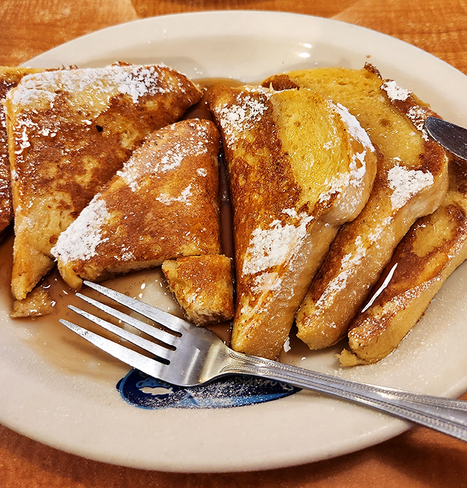 French toast so perfectly golden and syrup-soaked, it makes you wonder why people waste time with lesser breakfast options.