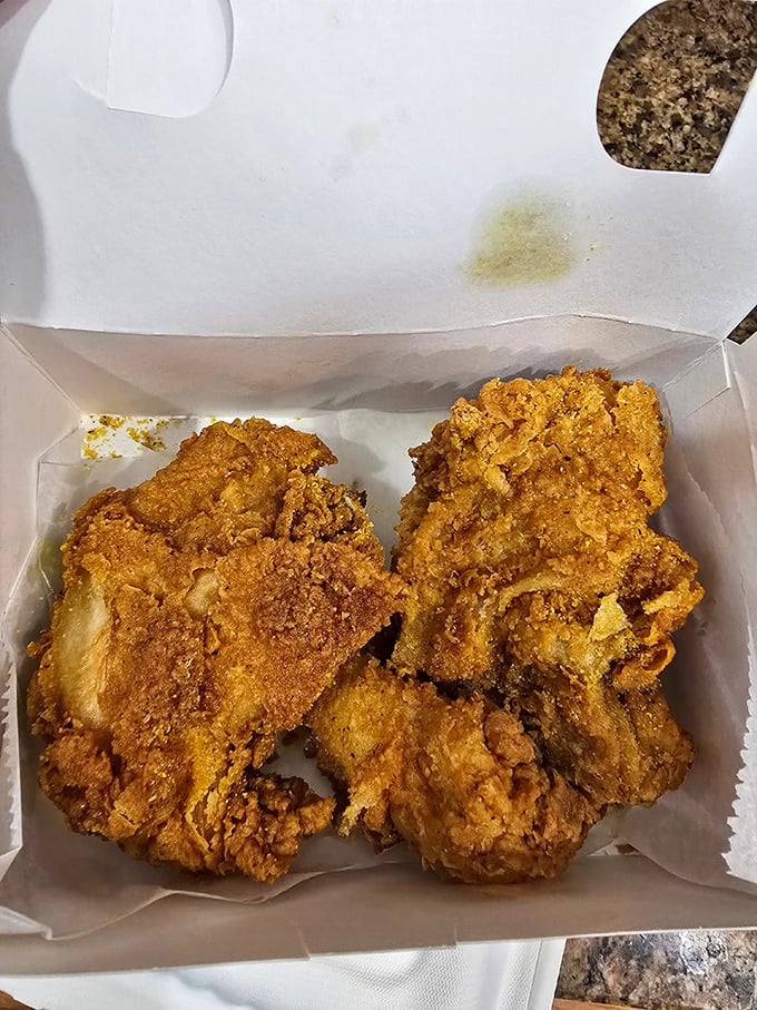 Two pieces of fried chicken perfection that make you wonder if they've somehow engineered a way to make the outside crunchier and the inside juicier.