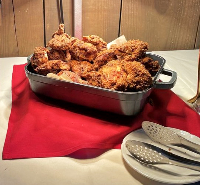 Fried chicken that's having its glamour shot moment. That crispy exterior is the tuxedo; the juicy meat inside is the VIP it's protecting.
