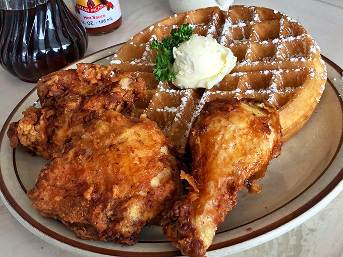 Whoever first paired chicken and waffles deserves a Nobel Prize. The sweet-savory combination here is the culinary equivalent of a perfect marriage.