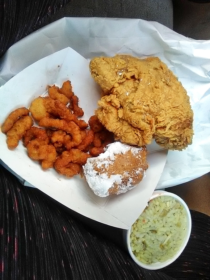 The seafood platter brings together crispy shrimp, golden chicken, and a powdered fritter&mdash;proof that Jim Dandy knows more than one way to fry your troubles away.