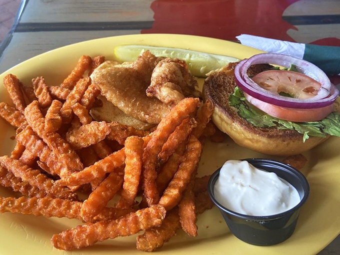 The ultimate beach sandwich: crispy fish nestled in a soft bun with those addictive sweet potato fries. Comfort food that somehow feels like a health food.