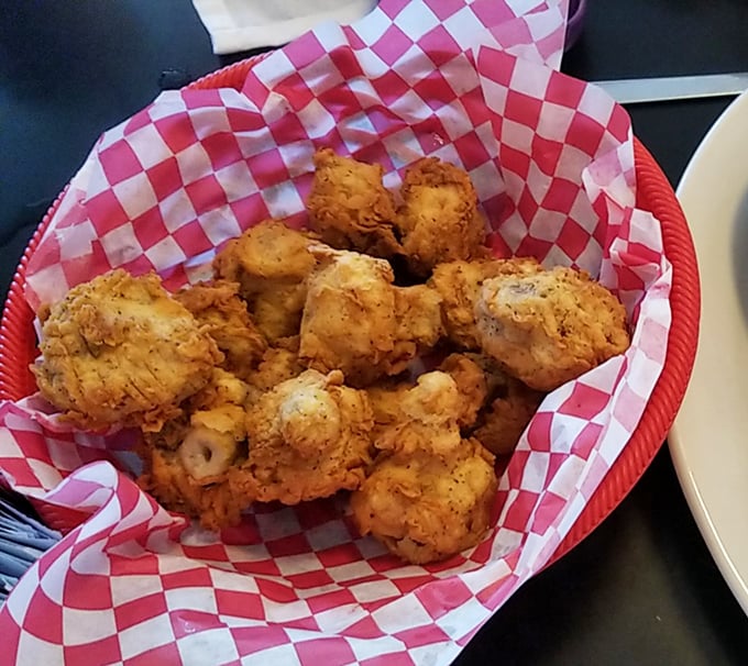 Golden-fried mushrooms nestled in a red checkered basket&mdash;crispy outside, juicy inside, and utterly impossible to stop eating.