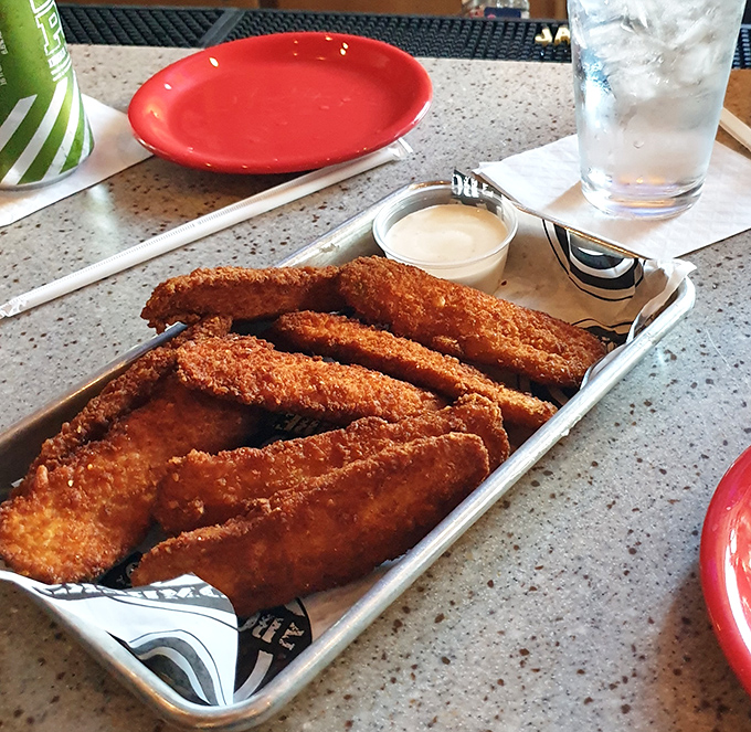 These aren't just fried pickles&mdash;they're a masterclass in contradictions: crunchy outside, tangy inside, and somehow both virtuous and decadent at once.