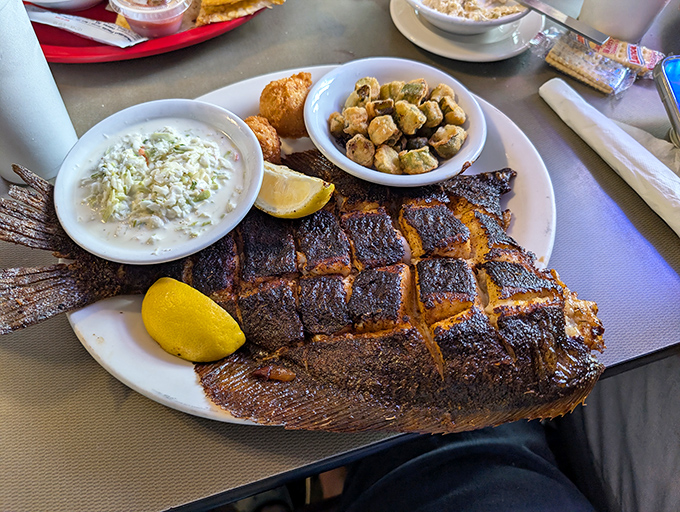That blackened fish with its perfect crosshatch grill marks is the seafood equivalent of a standing ovation. The sides aren't afterthoughts; they're worthy supporting actors.