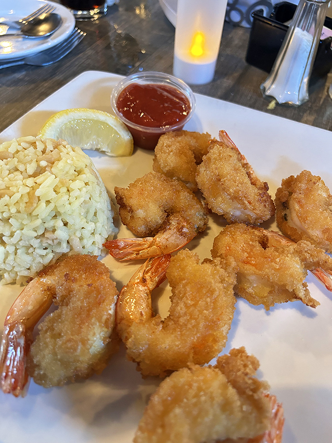 Golden-fried shrimp that crunch like a satisfying high-five to your taste buds, paired with pillowy rice that's ready to soak up every drop of that dipping sauce.