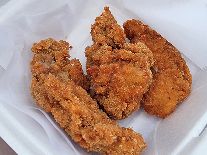 Fried walleye that's traveled less distance than your morning commute, wearing a crispy coating that shatters with satisfying precision at first bite.