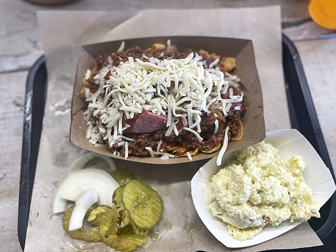Texas ingenuity on a plate: Frito pie with all the fixings. Comfort food that somehow manages to be both nostalgic and exciting.