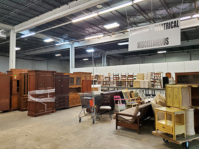 The furniture section – where that perfect vintage credenza waits patiently between dining chairs and the occasional velvet fainting couch
