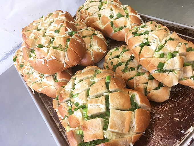 Garlic bread that's been given the royal treatment&mdash;crosshatched, herb-flecked, and ready to elevate your dinner from mundane to magnificent.