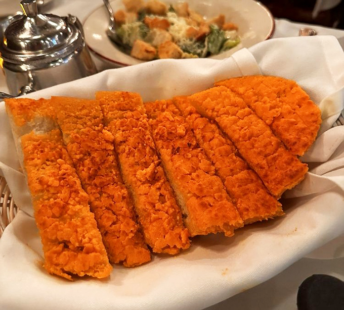 The legendary garlic cheese bread&mdash;golden, crispy, and buttery enough to make your cardiologist wince and your taste buds applaud.