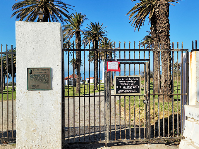 "Federal Property" signs: the lighthouse equivalent of "look but don't touch." Still, what a view from behind these historic gates!