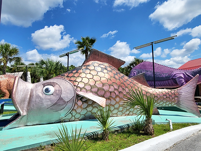 This giant fish has been catching golf balls instead of worms since the Kennedy administration. Its scales shimmer with decades of Florida sunshine.