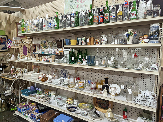 We'll need more shelves at home, you'll whisper to yourself, eyeing this spectacular array of vintage bottles and glassware catching light from above.