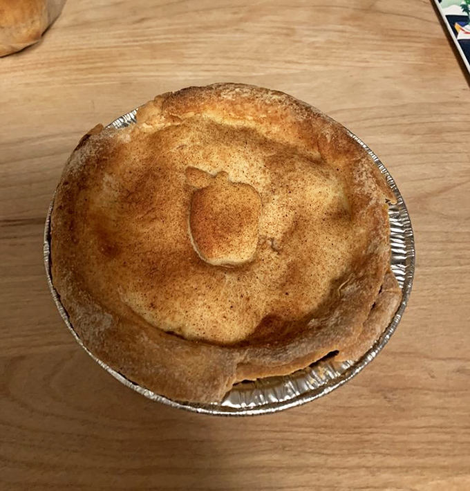 An apple pie so golden and perfect, it looks like it should have its own Instagram account. Cinnamon-dusted crust that whispers "come hither."