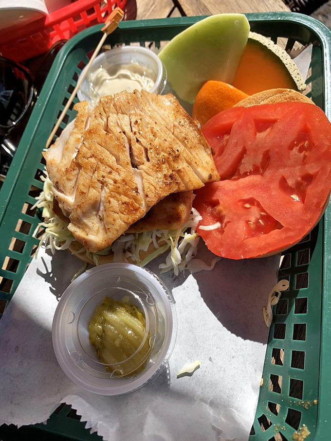 Simple yet profound&mdash;this grilled mahi on fresh slaw with a side of paradise. That slice of melon isn't dessert, it's a palate-refreshing intermission.