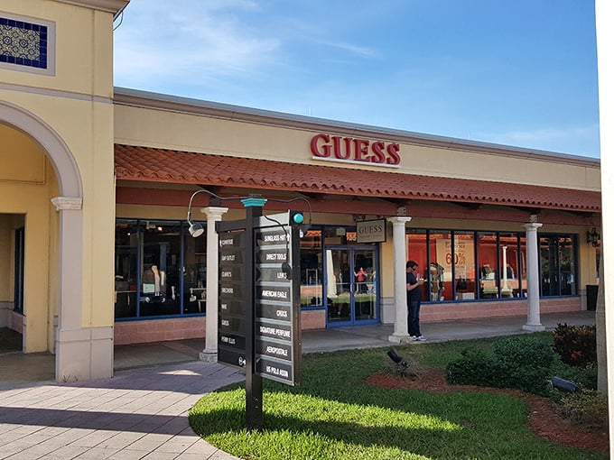 GUESS what store this is? The iconic brand's storefront blends seamlessly with the mall's Mediterranean aesthetic&mdash;fashion with a Florida twist.
