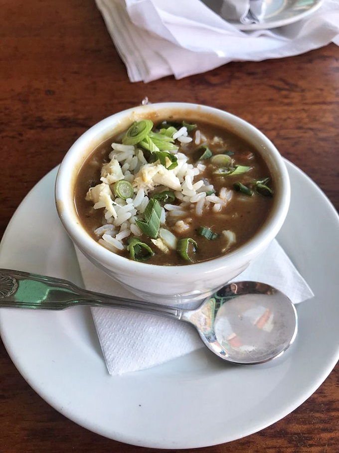 A proper seafood gumbo that's darker than a Florida thundercloud, topped with rice and green onions&mdash;liquid comfort in a bowl.