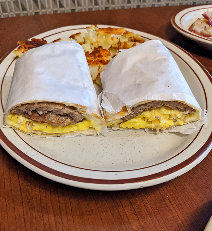 Breakfast burritos that solve the age-old dilemma of whether to have eggs or sausage by simply saying "why not both?"