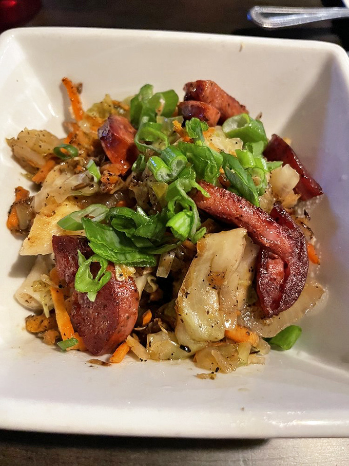 A beautiful chaos of kielbasa, cabbage, and vegetables that would make any Polish grandmother nod in silent approval.