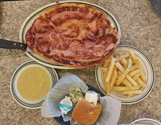 A ham steak so impressive it needs its own area code. Served with golden fries and gravy that could make cardboard taste delicious.