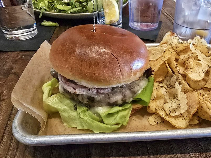 A burger that doesn't need gimmicks&mdash;just perfectly seasoned beef, fresh lettuce, and a bun that's achieved bread nirvana. Those house-made chips aren't messing around either.