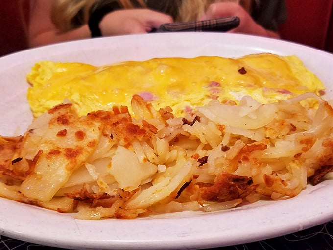 A Western omelet and hash browns that prove sometimes the simplest combinations create the most satisfying symphonies of flavor.