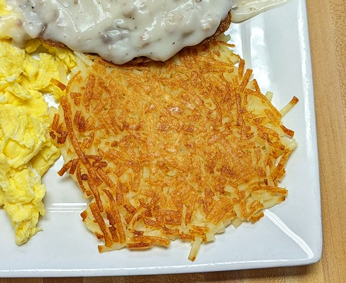 These aren't just hash browns; they're a golden-brown masterpiece of potato engineering with the perfect crisp-to-tender ratio.
