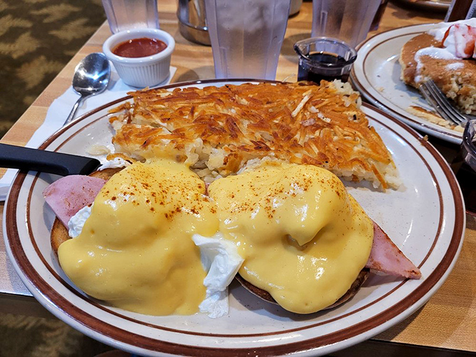Eggs Benedict meets crispy hash browns in a marriage that proves some combinations are simply meant to be.