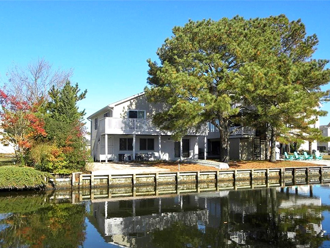 A waterfront home with character to spare, exemplifying the architectural charm that makes South Bethany's canal properties so coveted among those in the know.