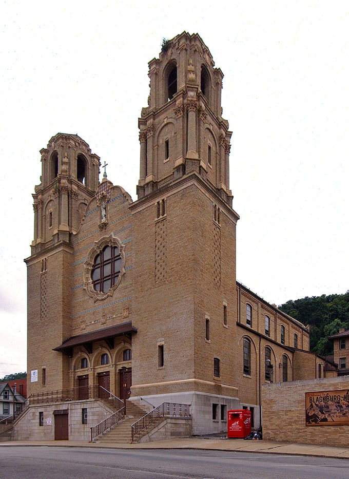 The impressive fa&ccedil;ade of St. Nicholas Croatian Catholic Church commands attention with its ornate twin towers and distinctive Romanesque-Byzantine architecture.