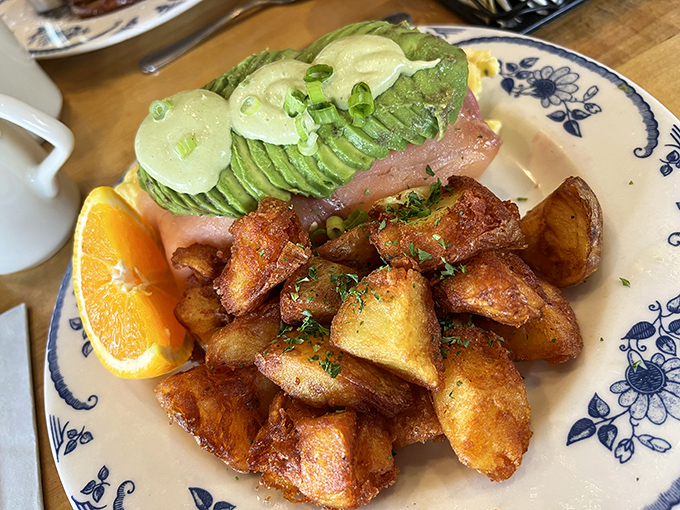 Golden home fries that understand their supporting role but steal scenes like seasoned character actors.