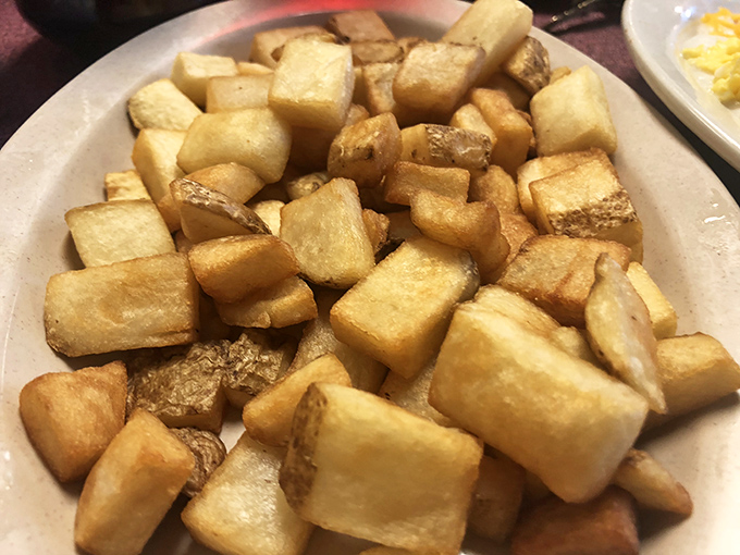 Home fries cubed and crisped to golden perfection - potato geometry that would make both your grandma and Euclid proud.