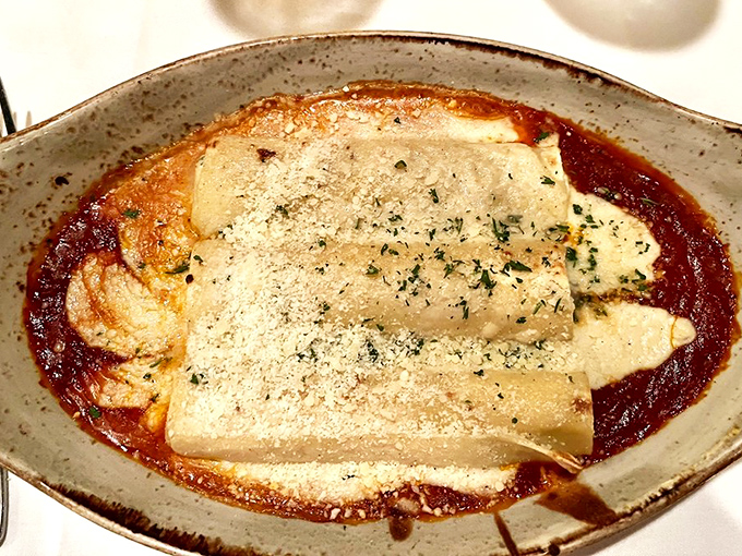Manicotti that's worth breaking your diet for &ndash; delicate pasta embracing a rich filling, all swimming in a sauce that whispers, "Take another bite."