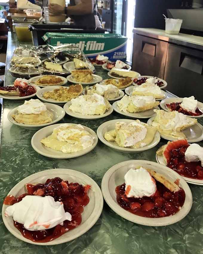 The pie parade! A lineup of fruit and cream creations that would make even the most dedicated dieter whisper, "Worth it."